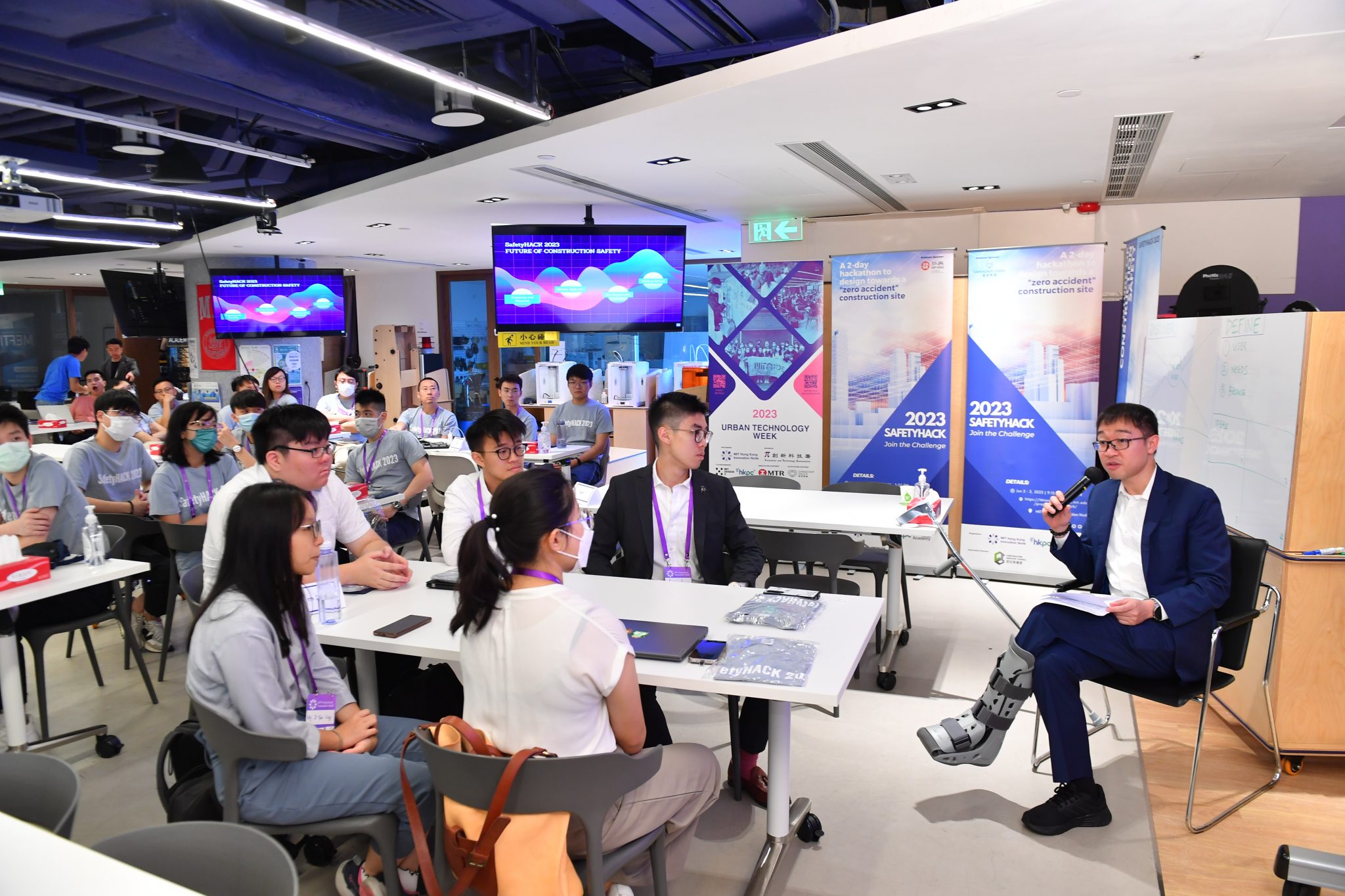 University students and professionals work together to design towards a ...